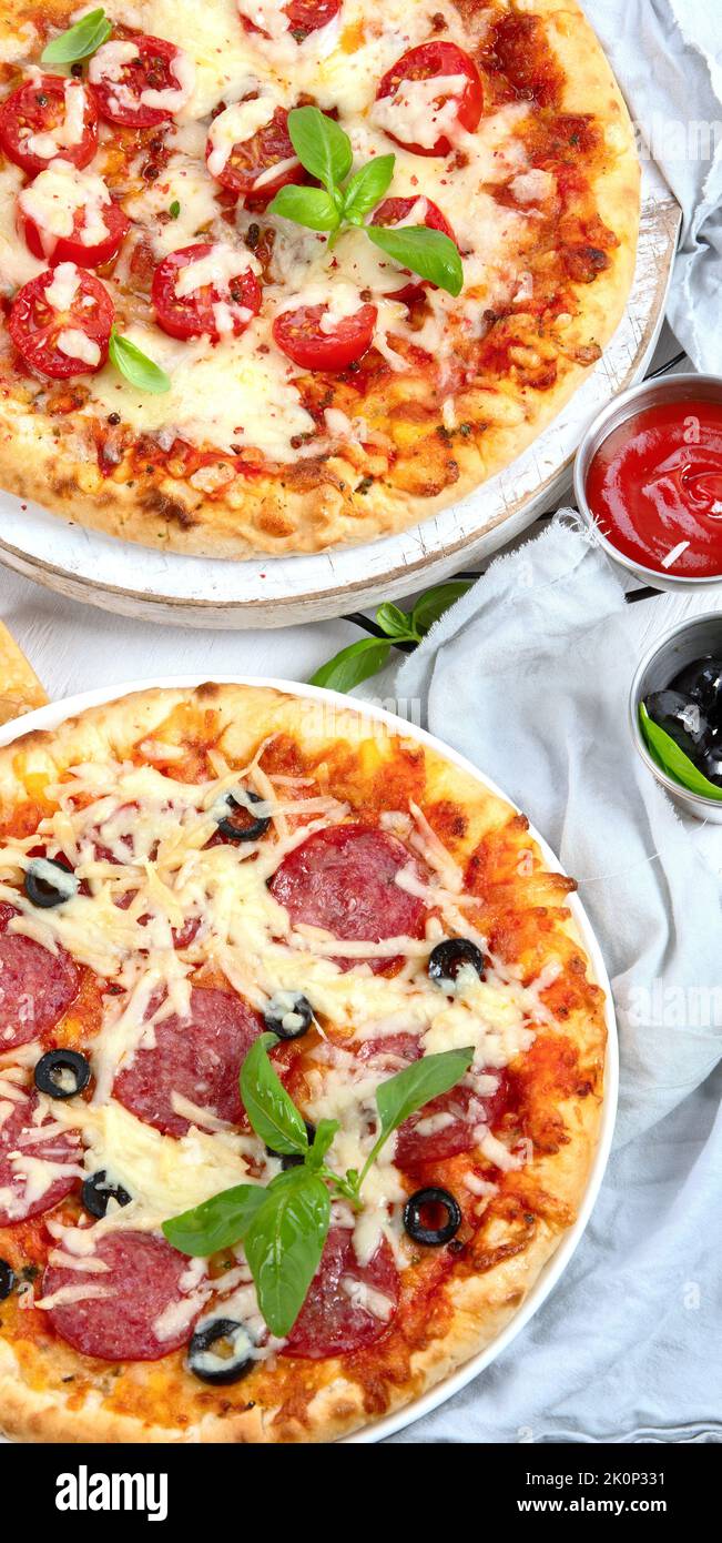 Freshly baked pizza on dark background. Tasty homemade food concept ...