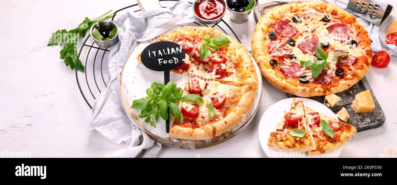 Freshly baked pizza on dark background. Tasty homemade food concept ...
