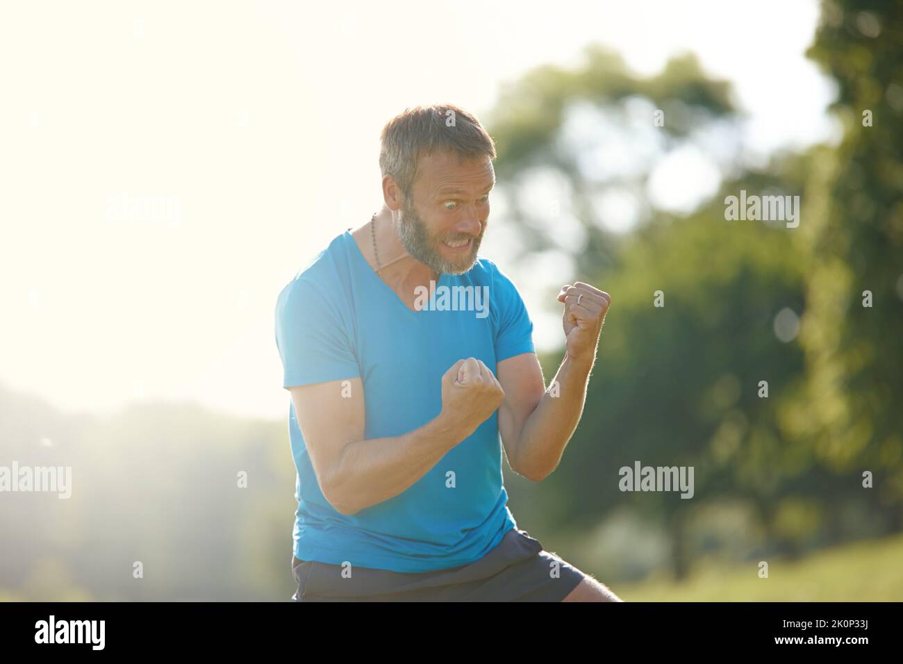 Hes enthusiastic about life. a mature man looking very excited while ...