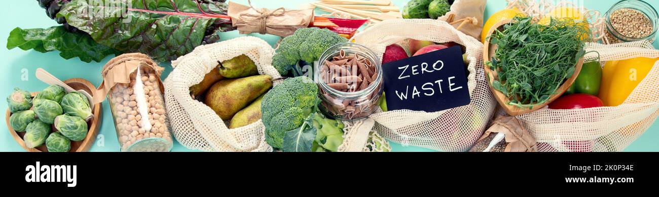 Various organic fruits and vegetables in reusable packaging bags. Eco ...