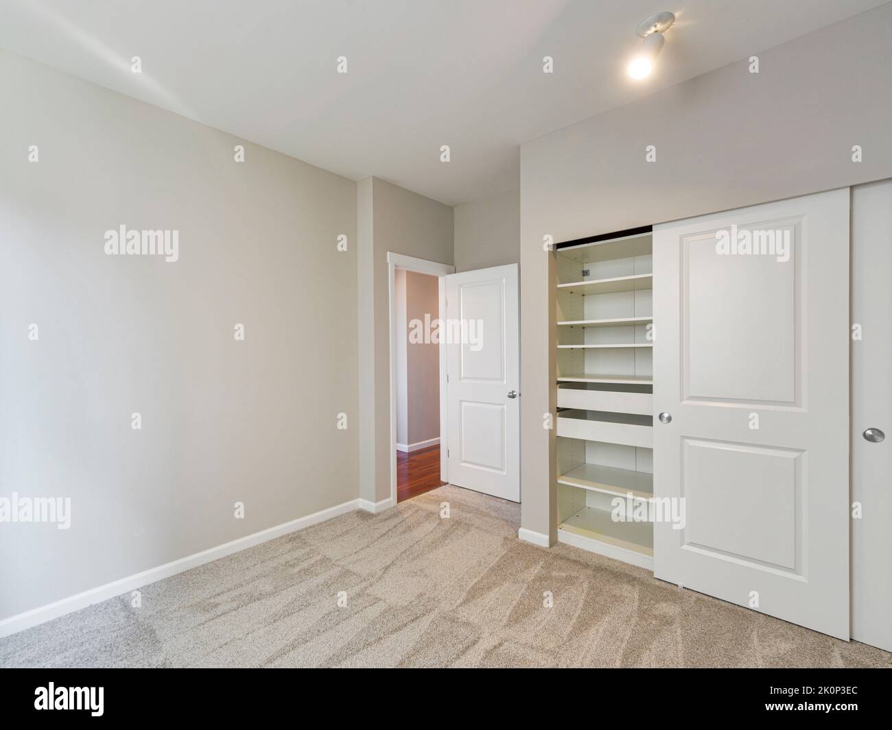 Modern residential empty bedroom interior Stock Photo - Alamy