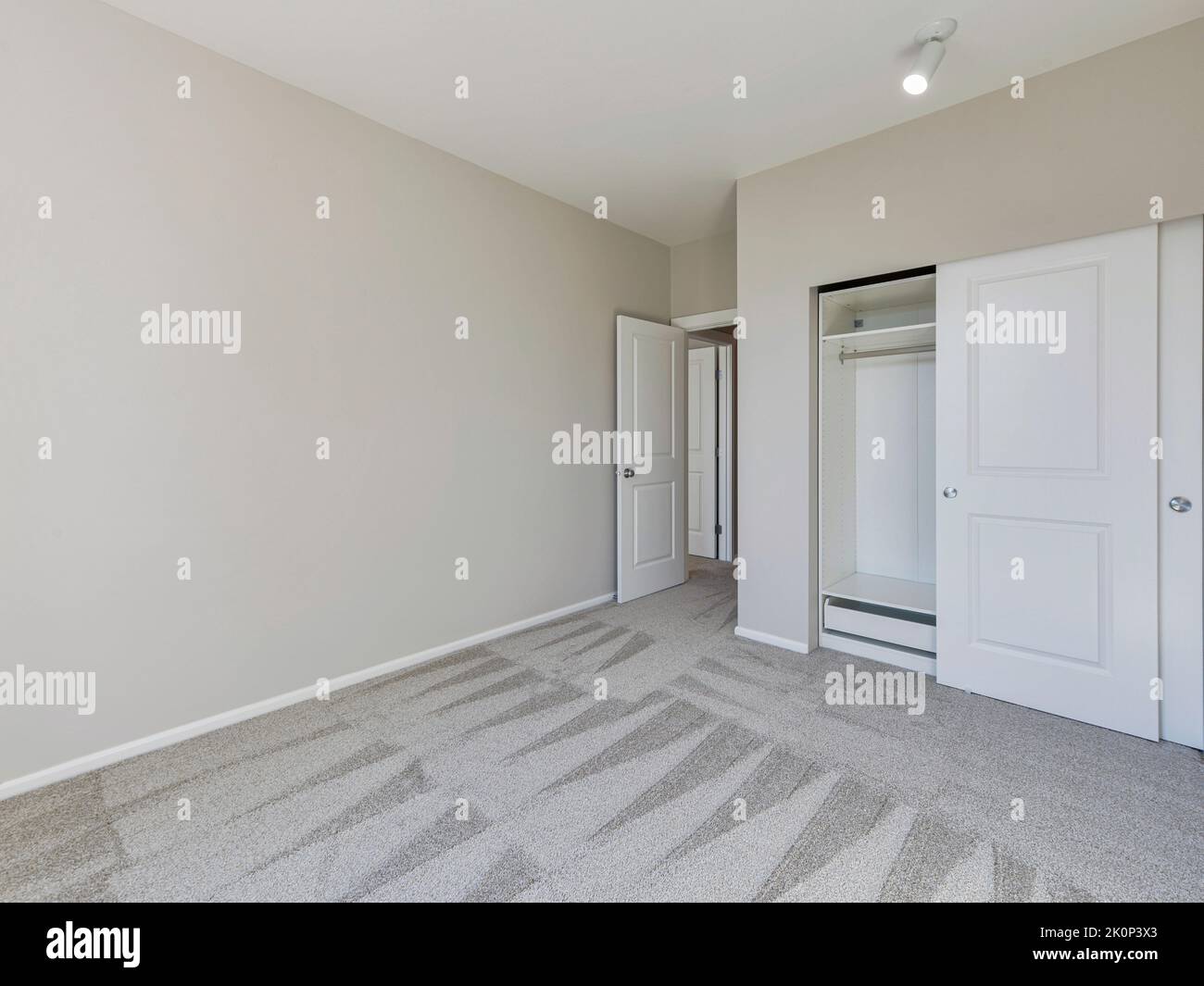 Modern residential empty bedroom interior Stock Photo - Alamy