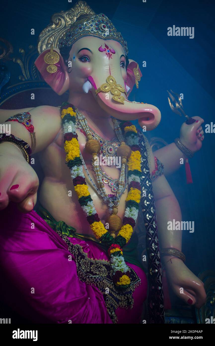 A statue of Lord Ganesha at a mandal in Mumbai for the auspicious ...