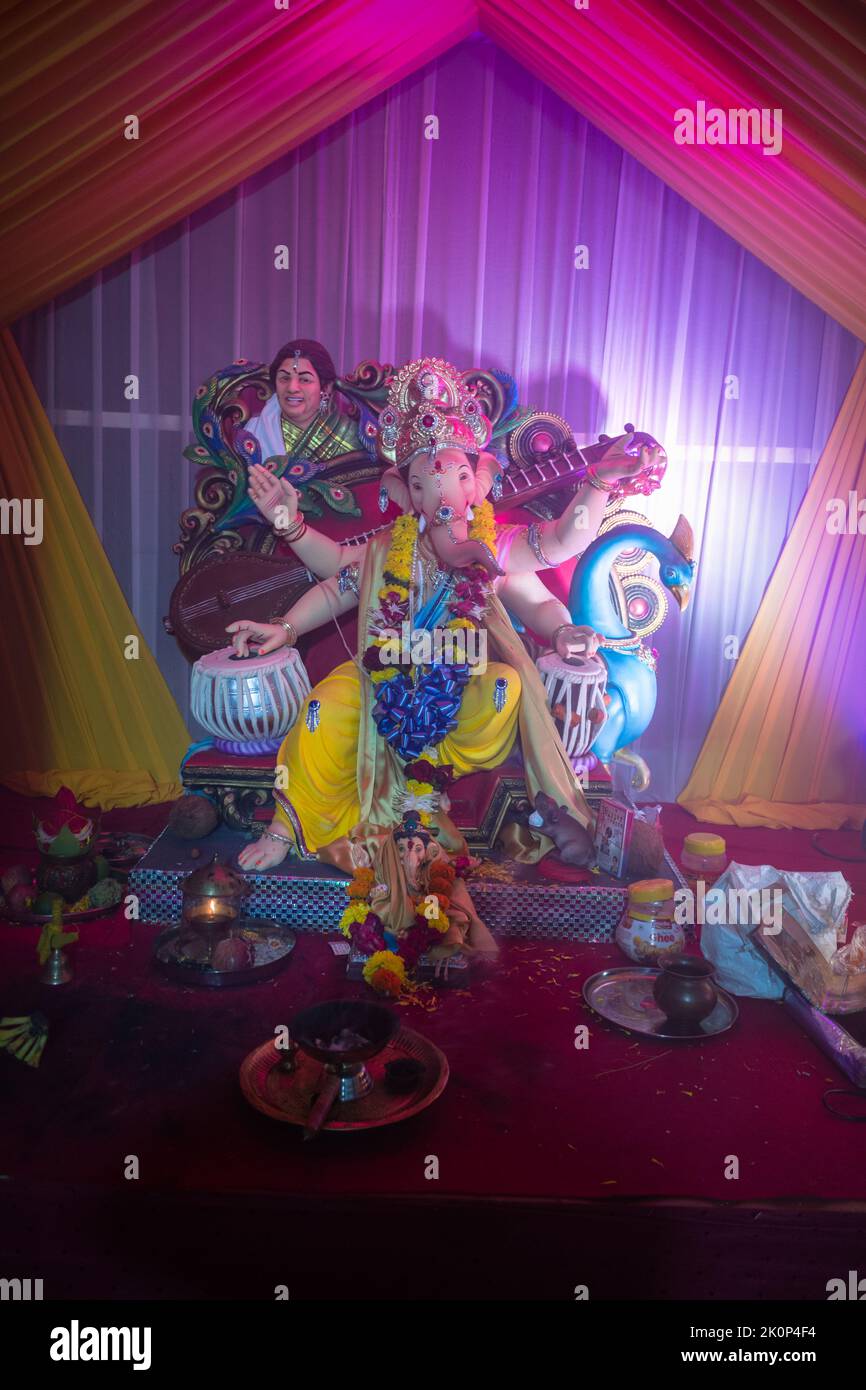 A statue of Lord Ganesha at a mandal in Mumbai for the auspicious ...