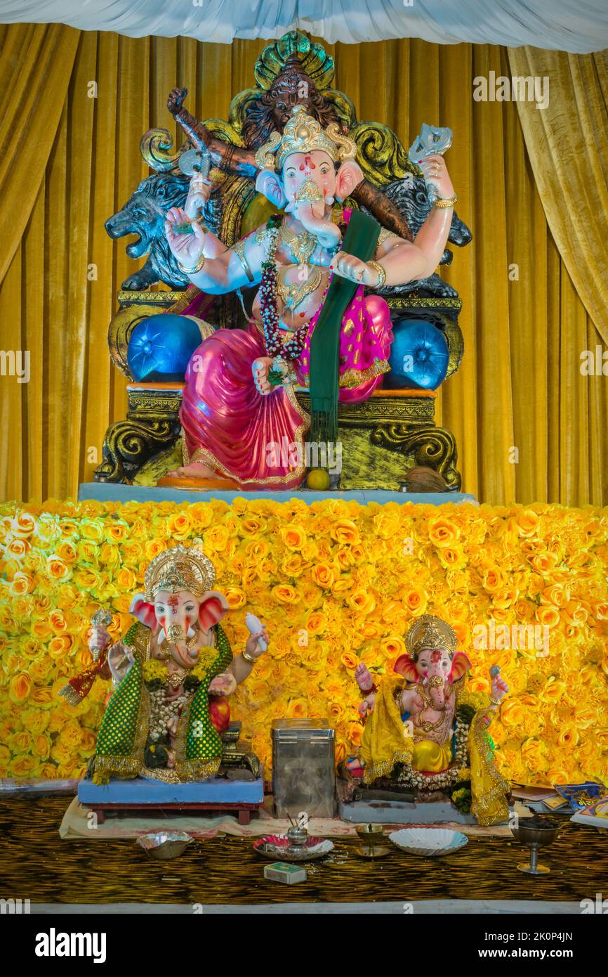 A statue of Lord Ganesha at a mandal in Mumbai for the auspicious ...