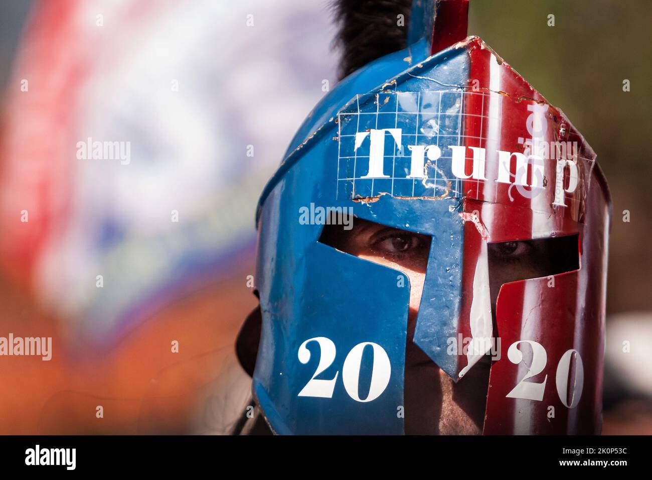 A self-described "soldier" in the "Trump Army," wears a trojan-style ...