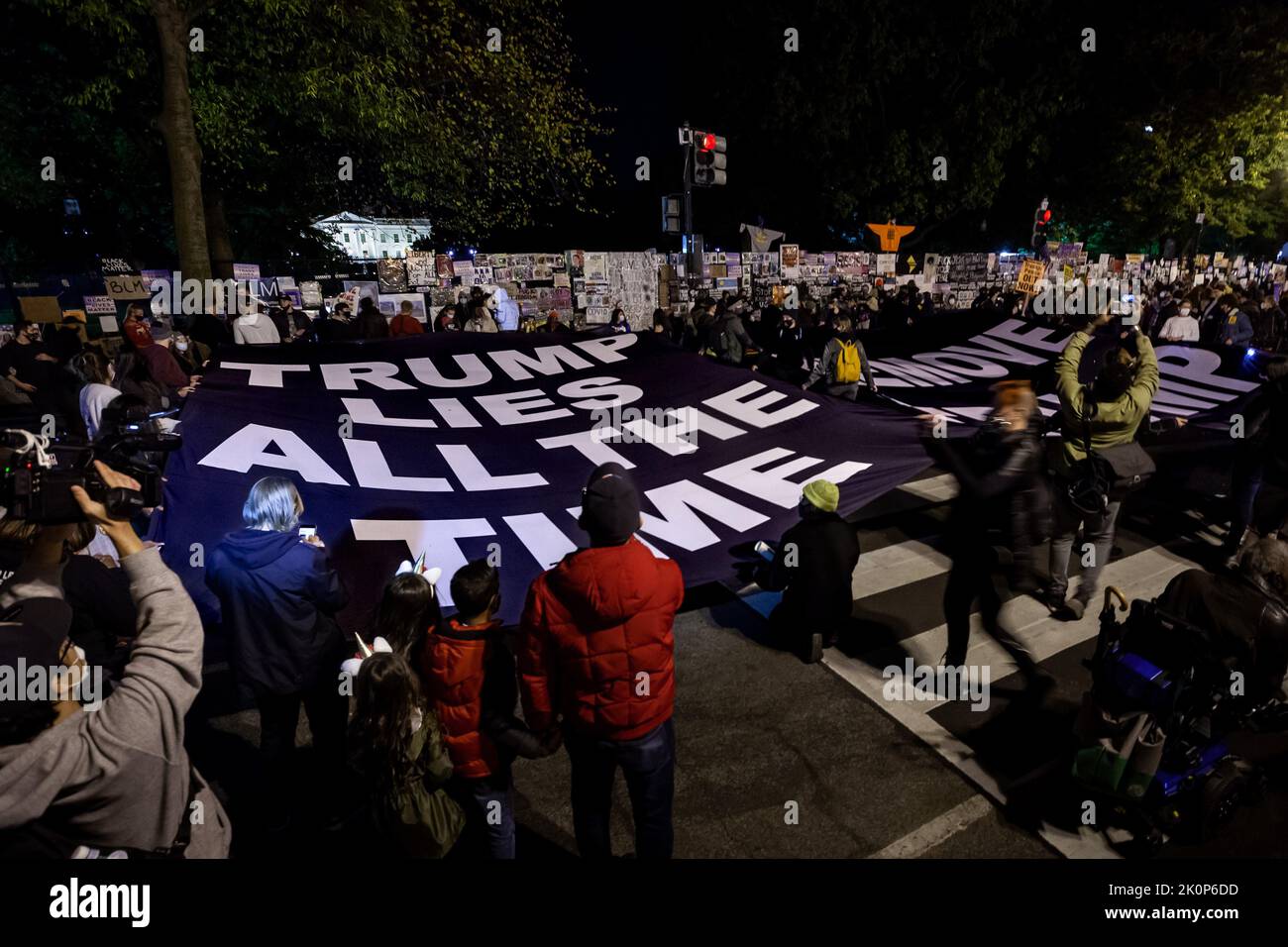 Washington, DC, USA. 3rd Nov, 2020. Trump opponents unfurl two large ...