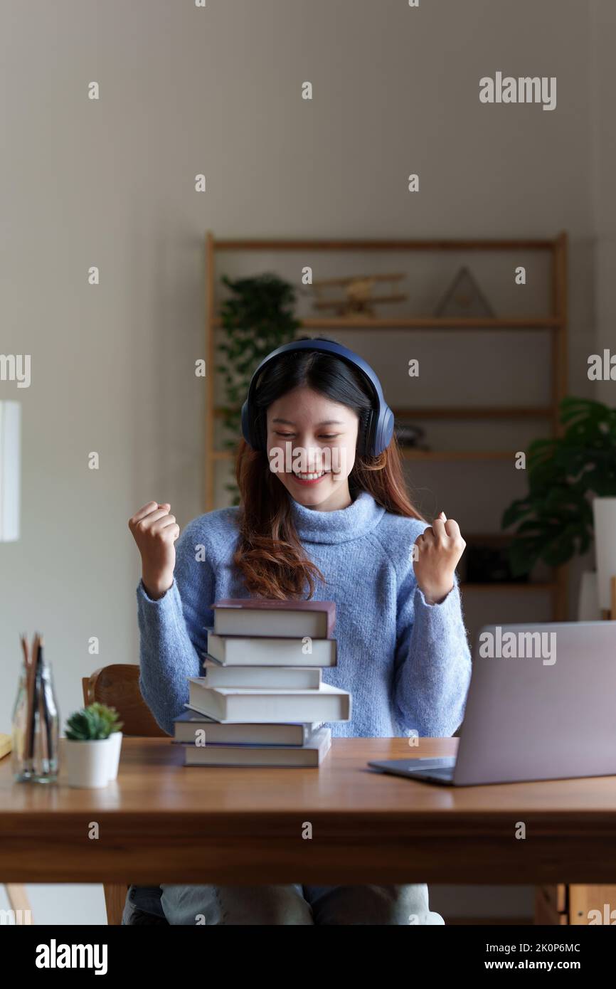 Young college student have question and answer to teacher by video call ...