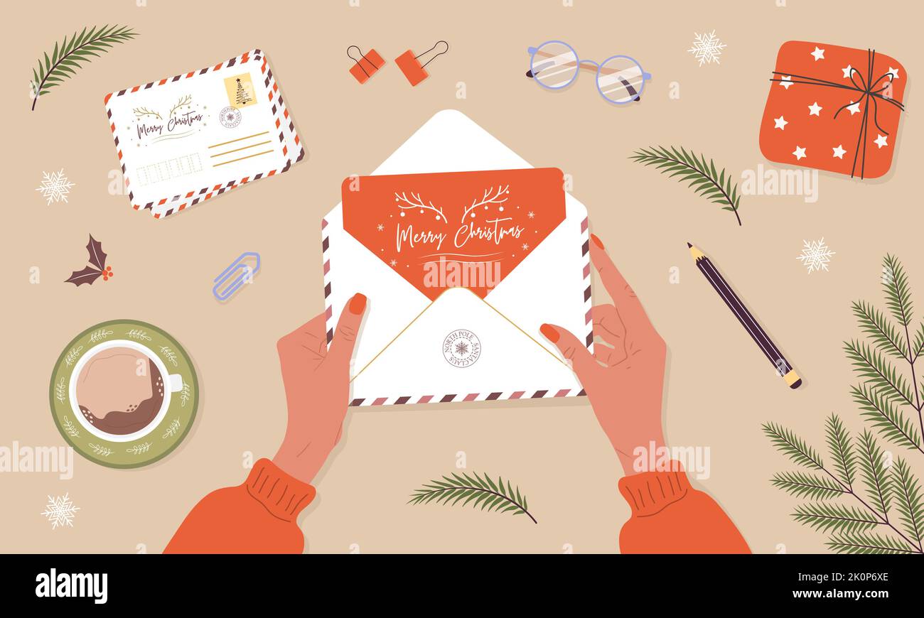 Female hands holding envelope. Woman making handmade greeting card ...