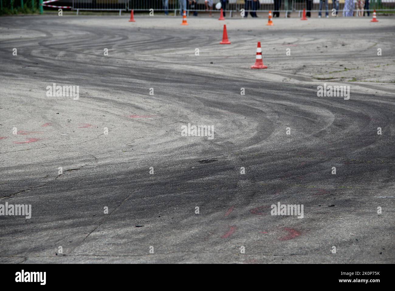 Drift track with tires traces between safety cones Stock Photo - Alamy