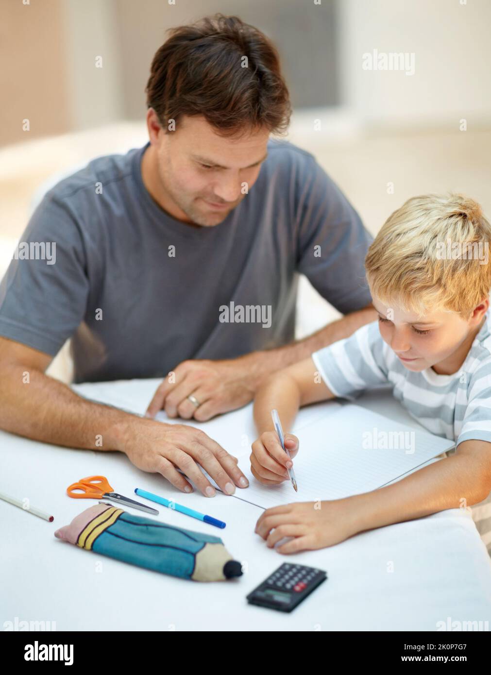 Dad is always ready to help - Single father. Young father helping his ...