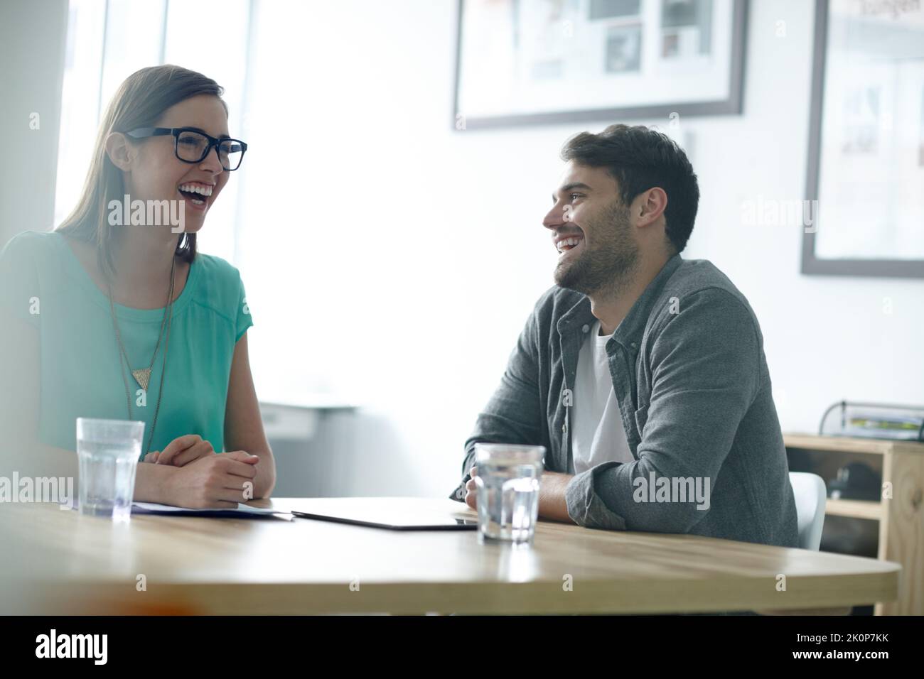 Sharing positive connections in the workplace. colleagues sharing ...