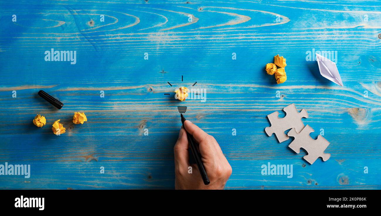 Conceptual image of brainstorming and innovation - hand of a ...