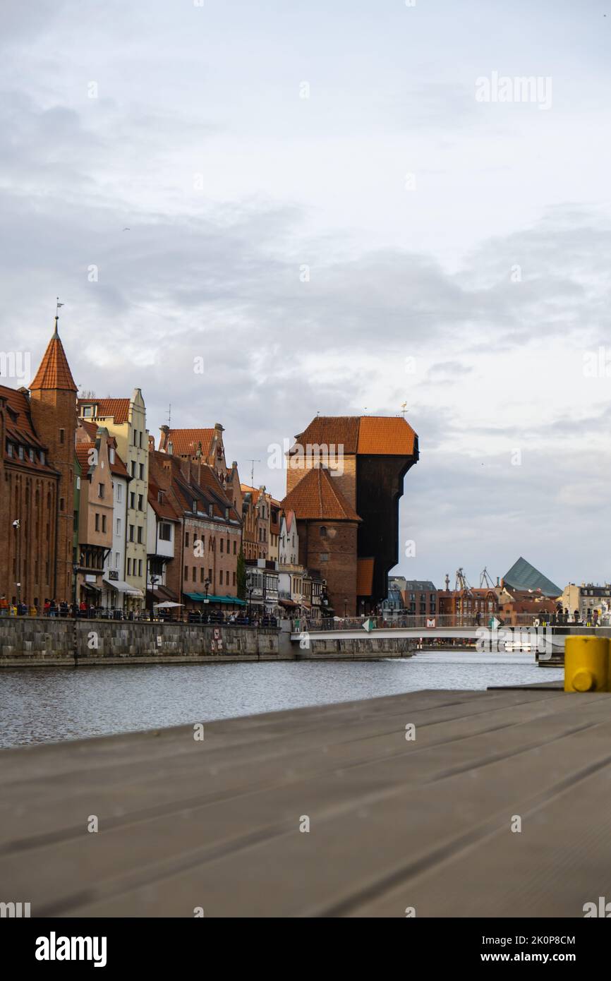 Ancient crane - zuraw Old town in Gdansk. The riverside on Granary ...
