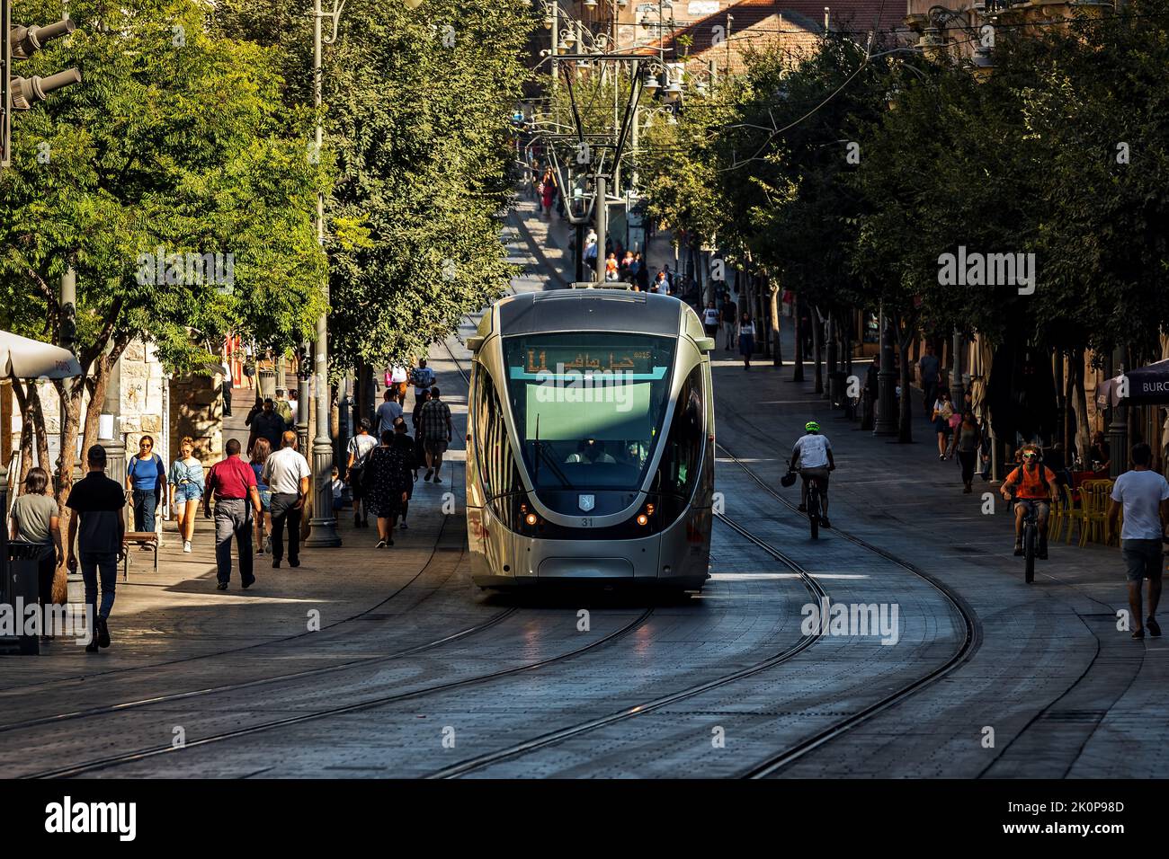 Modern tram and people walking on Jaffa road - one of the longest and ...