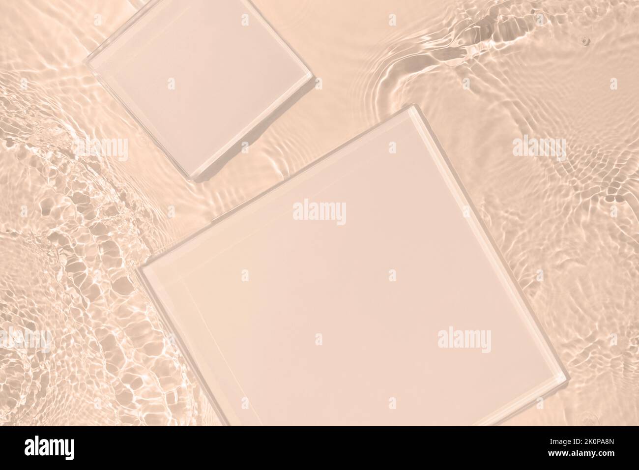Two empty square podiums on transparent beige water background Stock ...
