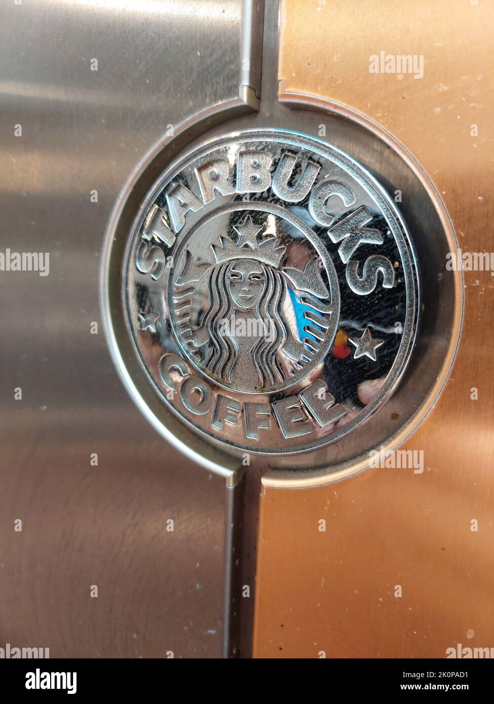 Logo of Starbucks coffeeshops chain embedded in metal Stock Photo - Alamy