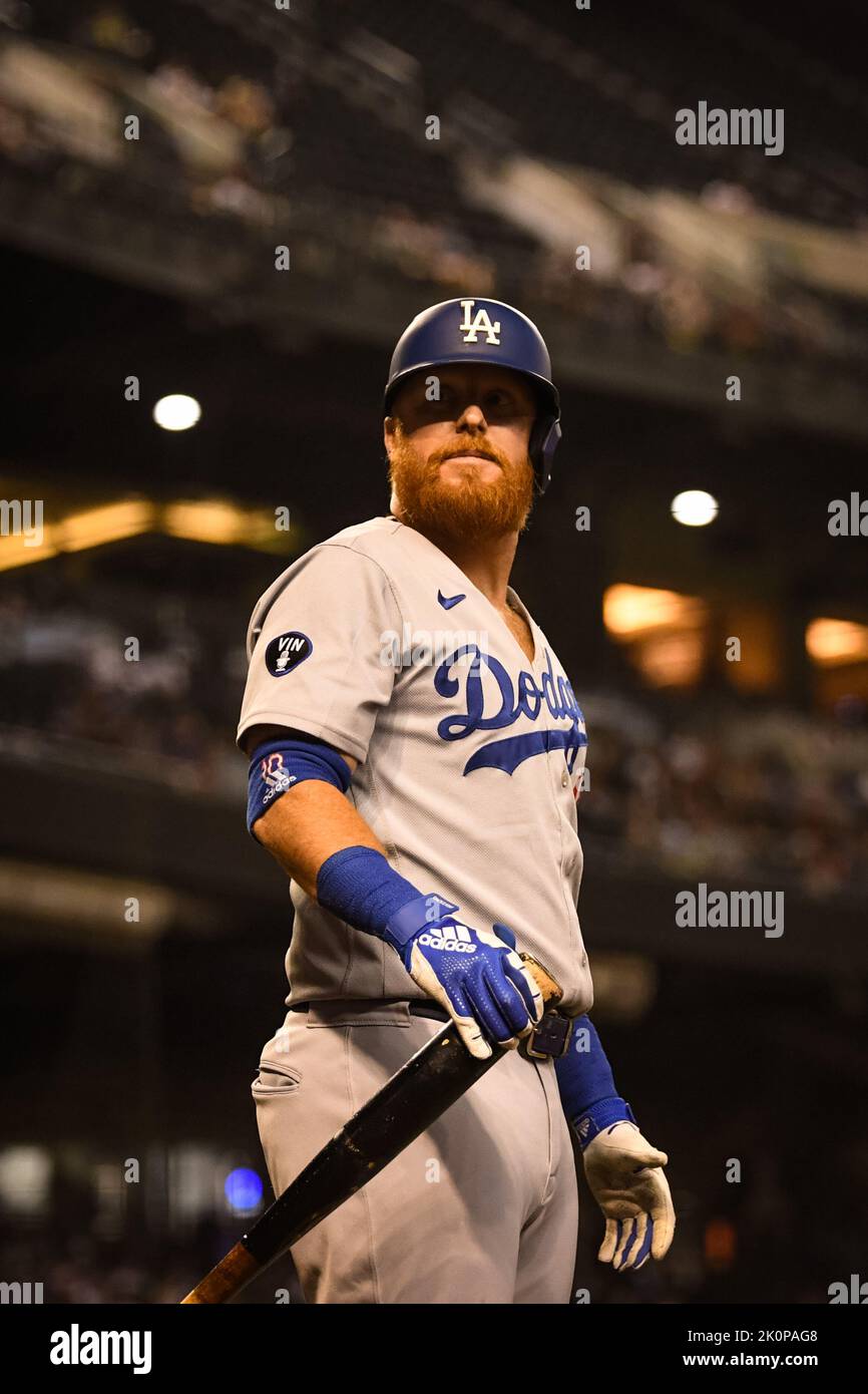 Los Angeles Dodgers designated hitter Justin Turner (10) stands in the ...