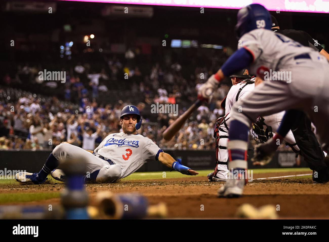 Los Angeles Dodgers left fielder Chris Taylor (3) slides into home ...