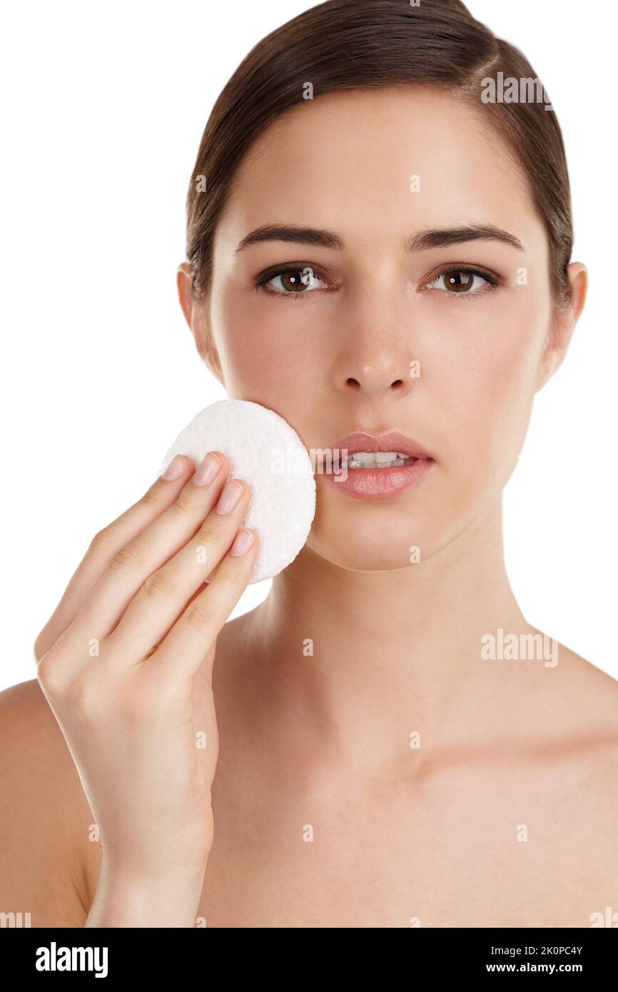 Exfoliating her skin. Cropped portrait of a beautiful young woman ...