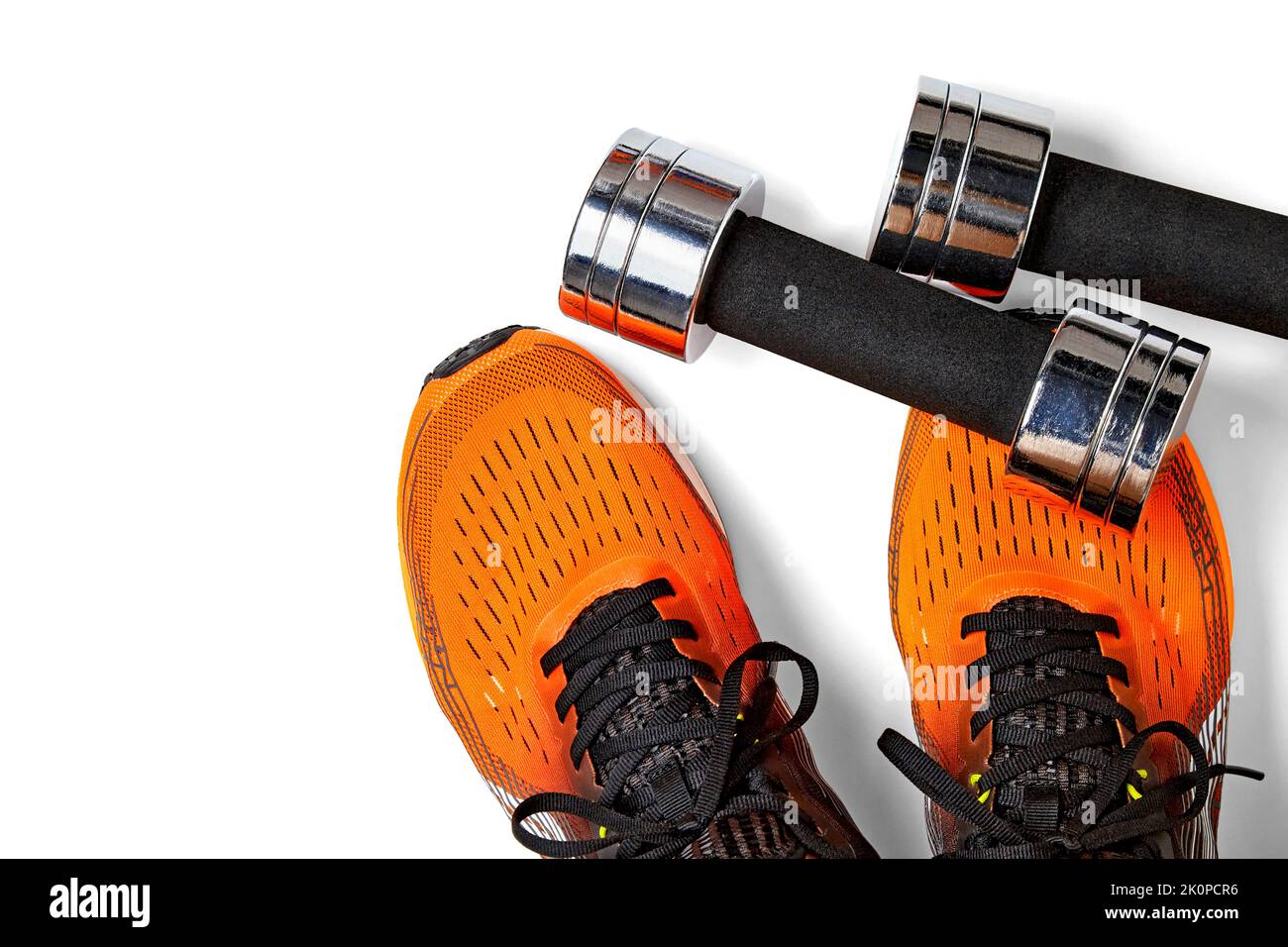 Fitness classes and foot injury in the gym. A metal heavy dumbbell fell ...