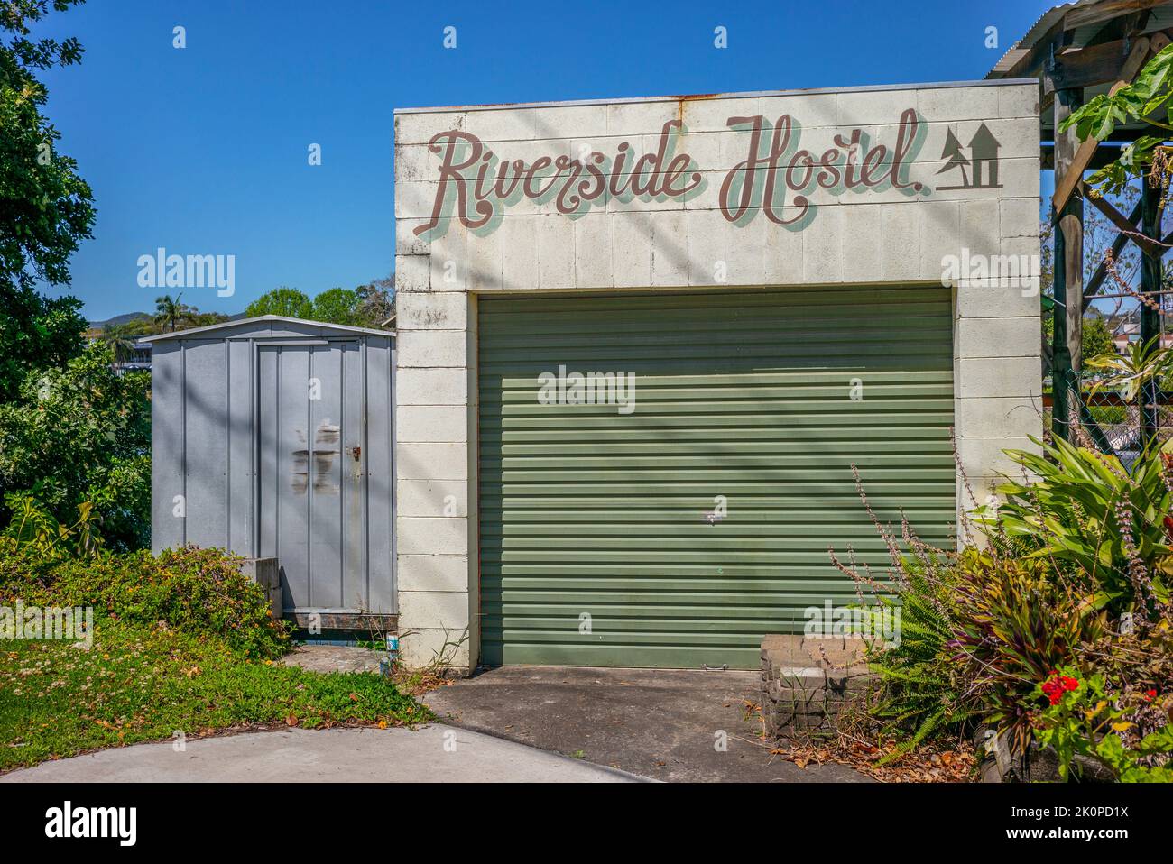 The garage to the side of the YHA Riverside Hostel next to the Tweed ...