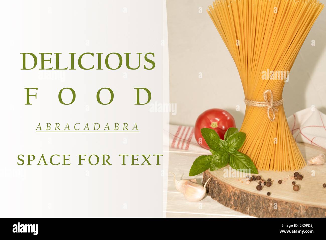 On the table is a pack of spaghetti tied with string. On a light ...