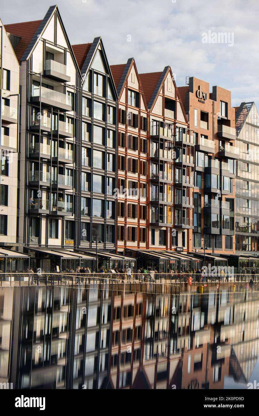 Modern buildings over the Motlawa River in Old Town. Abstract structure ...