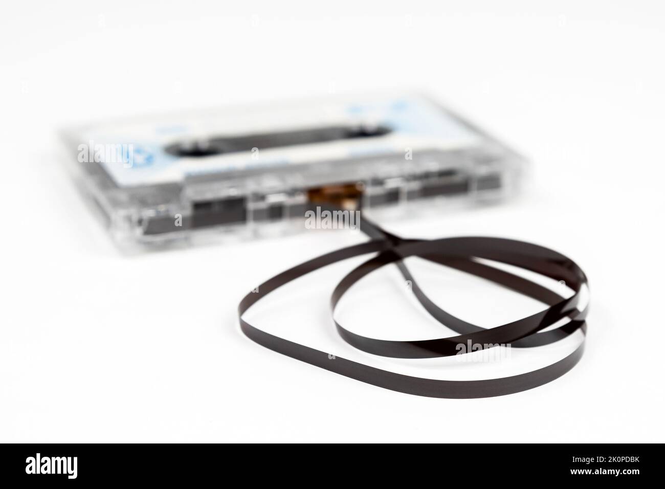 Old audio cassette with loose tape on white background Stock Photo - Alamy