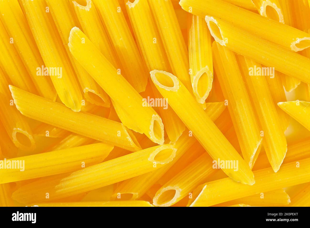 Italian pasta, called -penna- Background image Stock Photo - Alamy