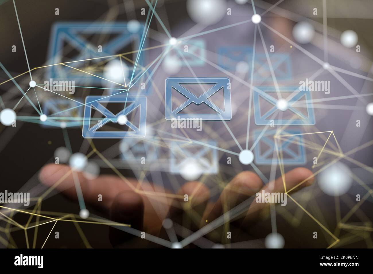A 3D rendering of lines connecting the email icons in a man's hand ...