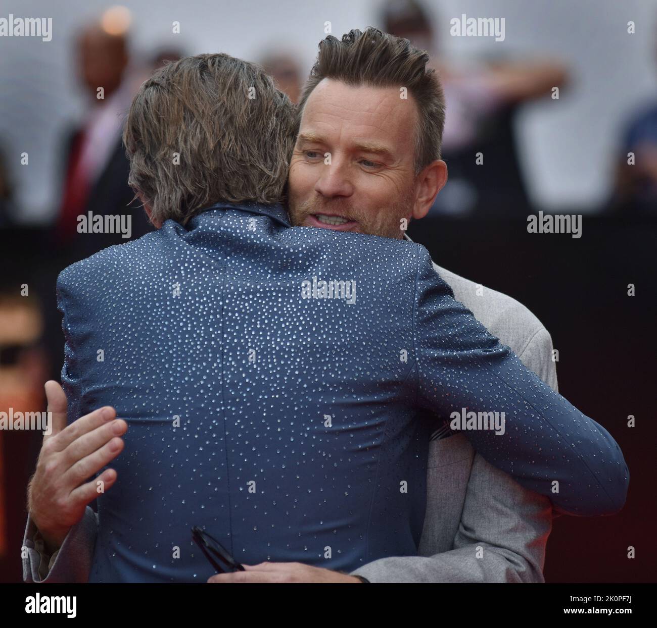 Toronto, Canada. 12th Sep, 2022. Ewan McGregor (R) and Ethan Hawke hug ...