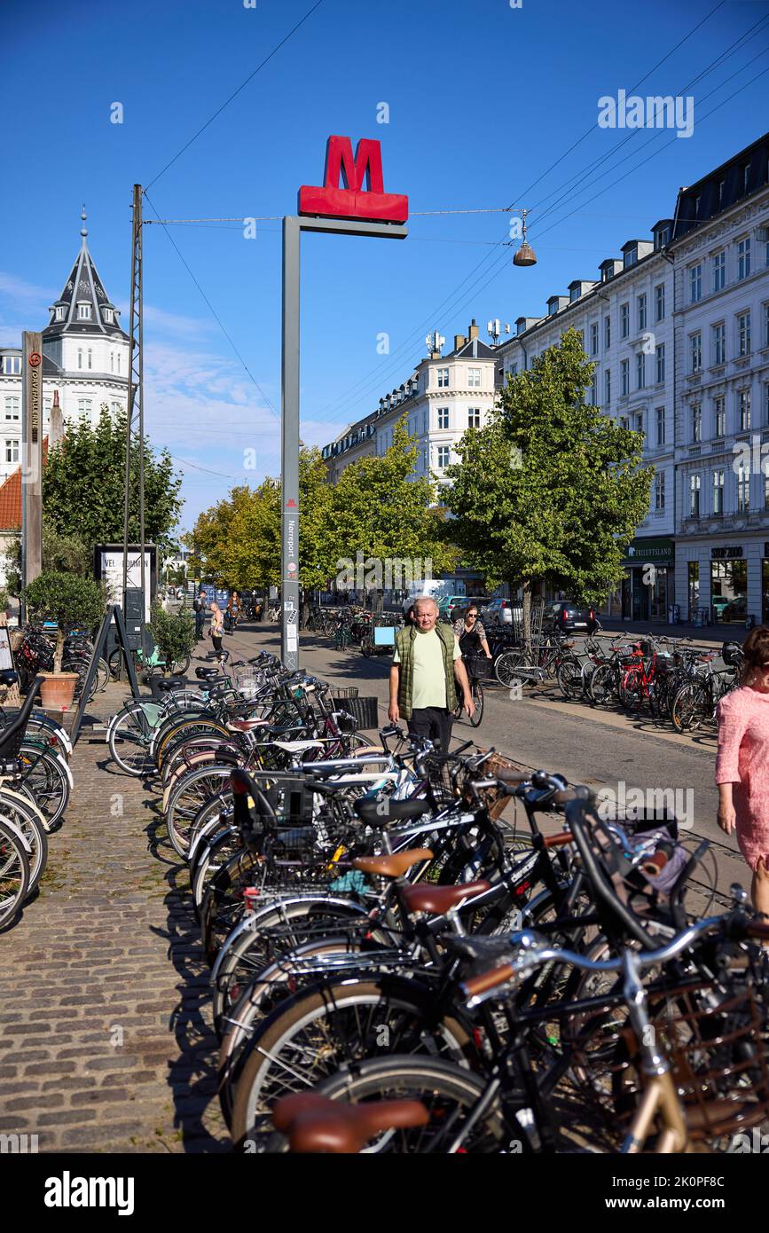 Metro sign, Nørreport Station, parked bikes in the foreground ...