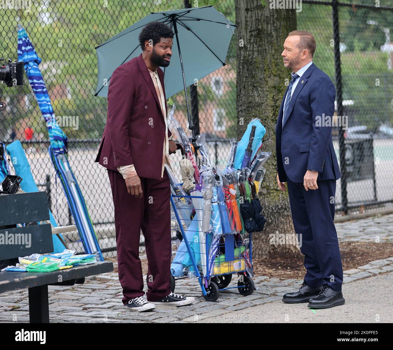 Donnie Wahlberg and Derek Gaines pictured filming at the `Blue Bloods ...