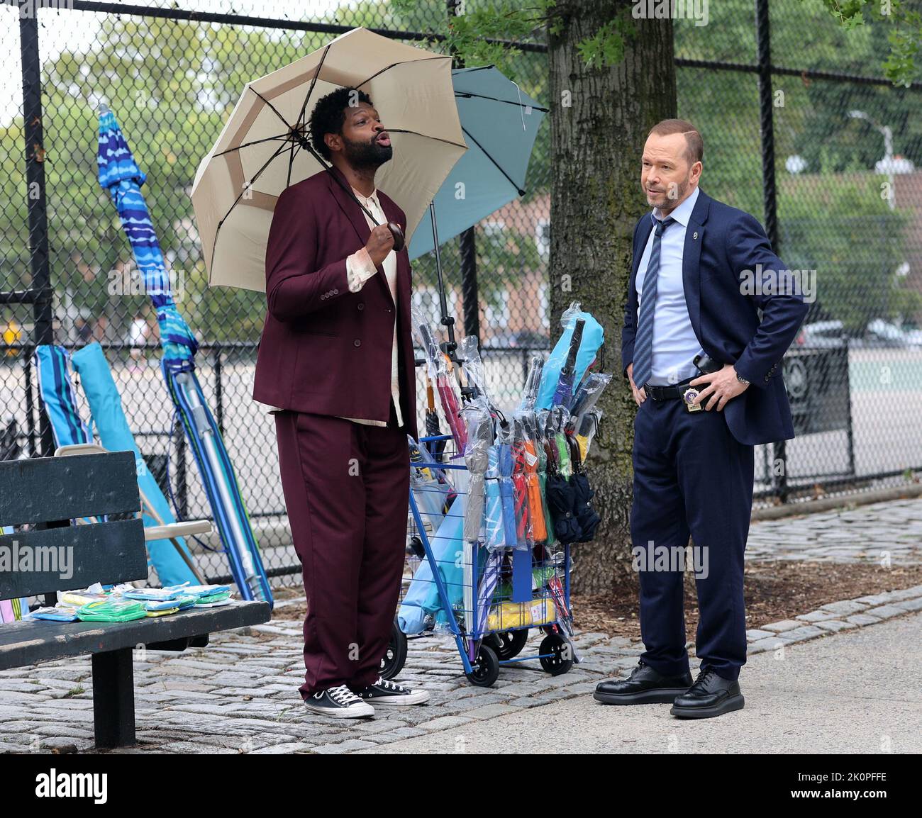 Donnie Wahlberg and Derek Gaines pictured filming at the `Blue Bloods ...