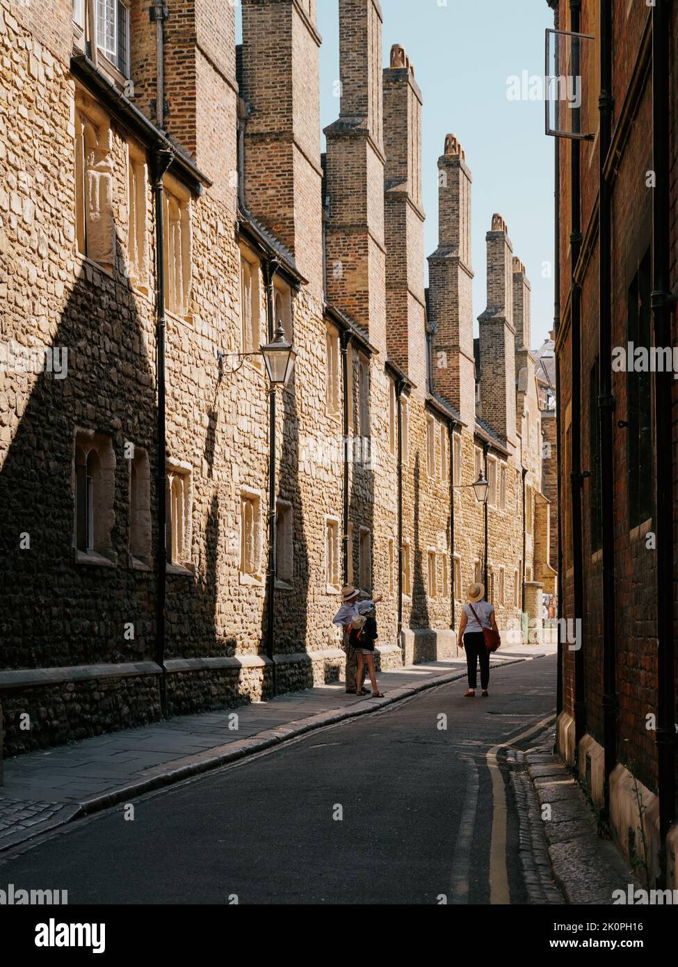 Tourists exploring the narrow streets and old buildings of Trinity ...