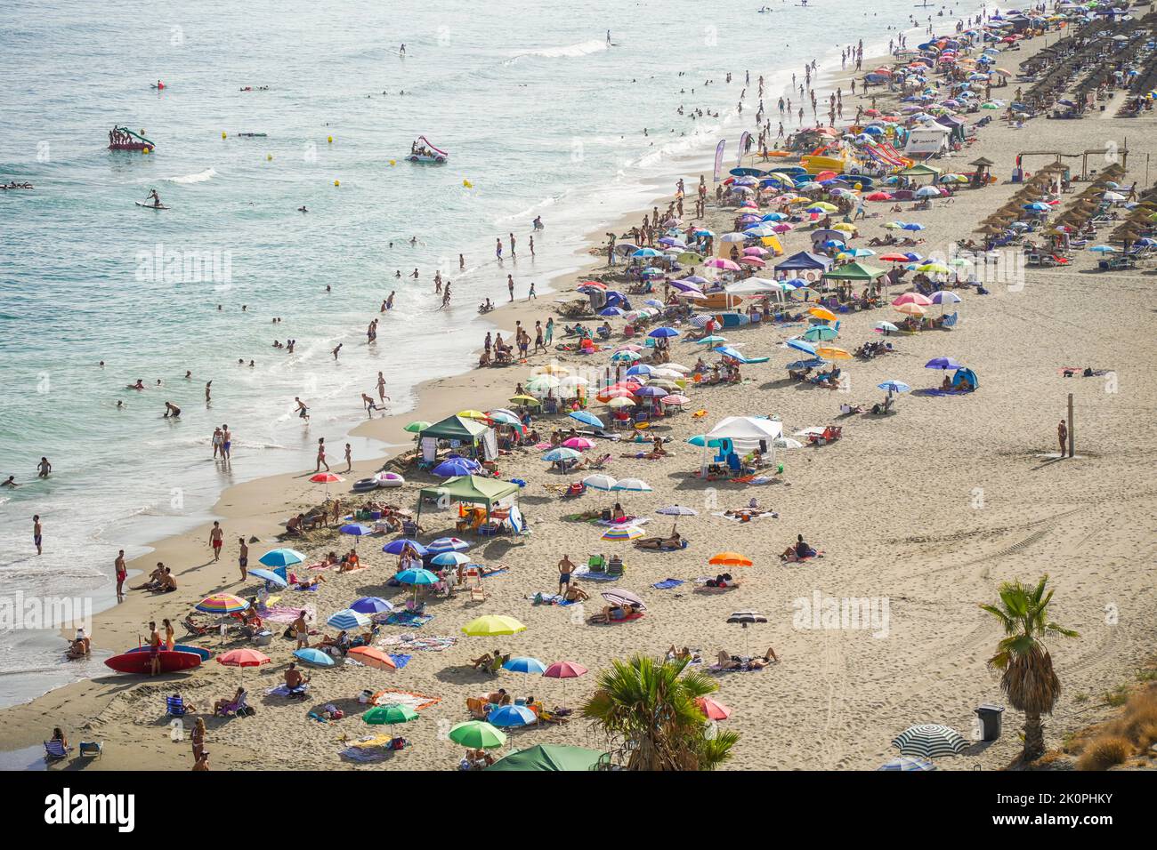 Crowded beach with parasols busy beach, Fuengirola, Los Boliches ...