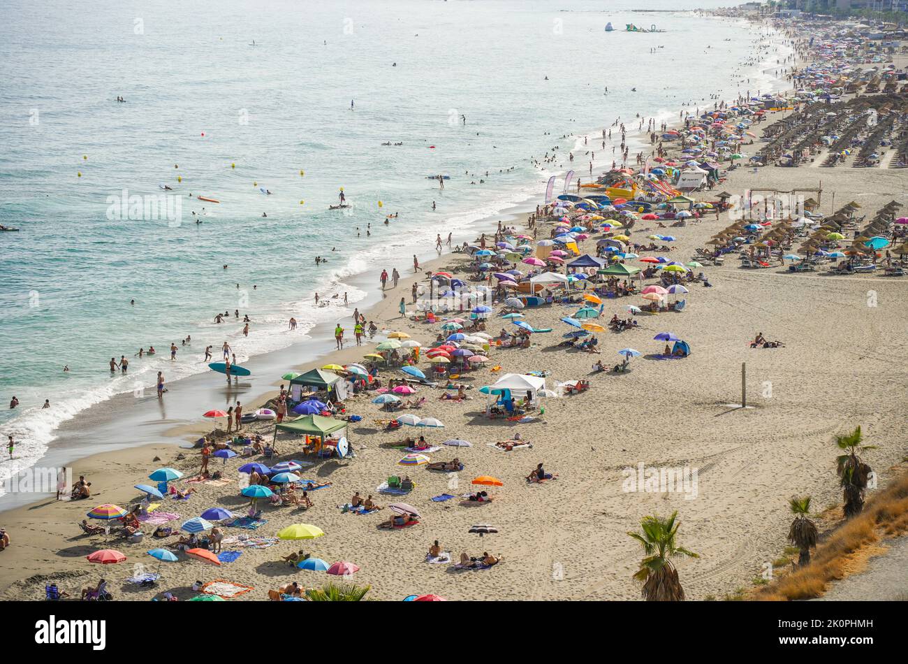 Crowded beach with parasols busy beach, Fuengirola, Los Boliches ...