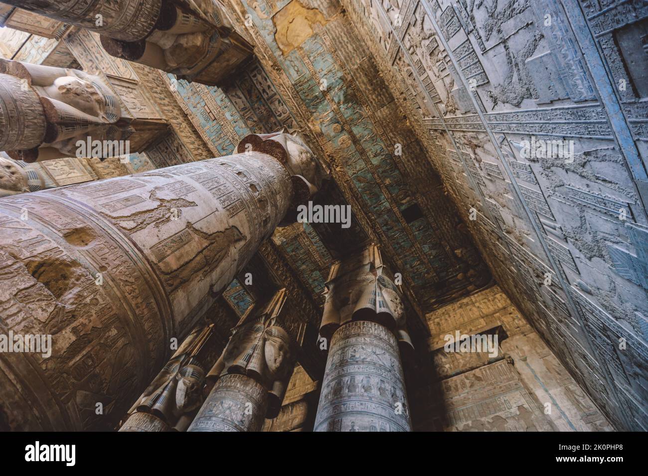View to an Ancient Egyptian Painted Pillars of the Dendera Temple complex in south-east of ...