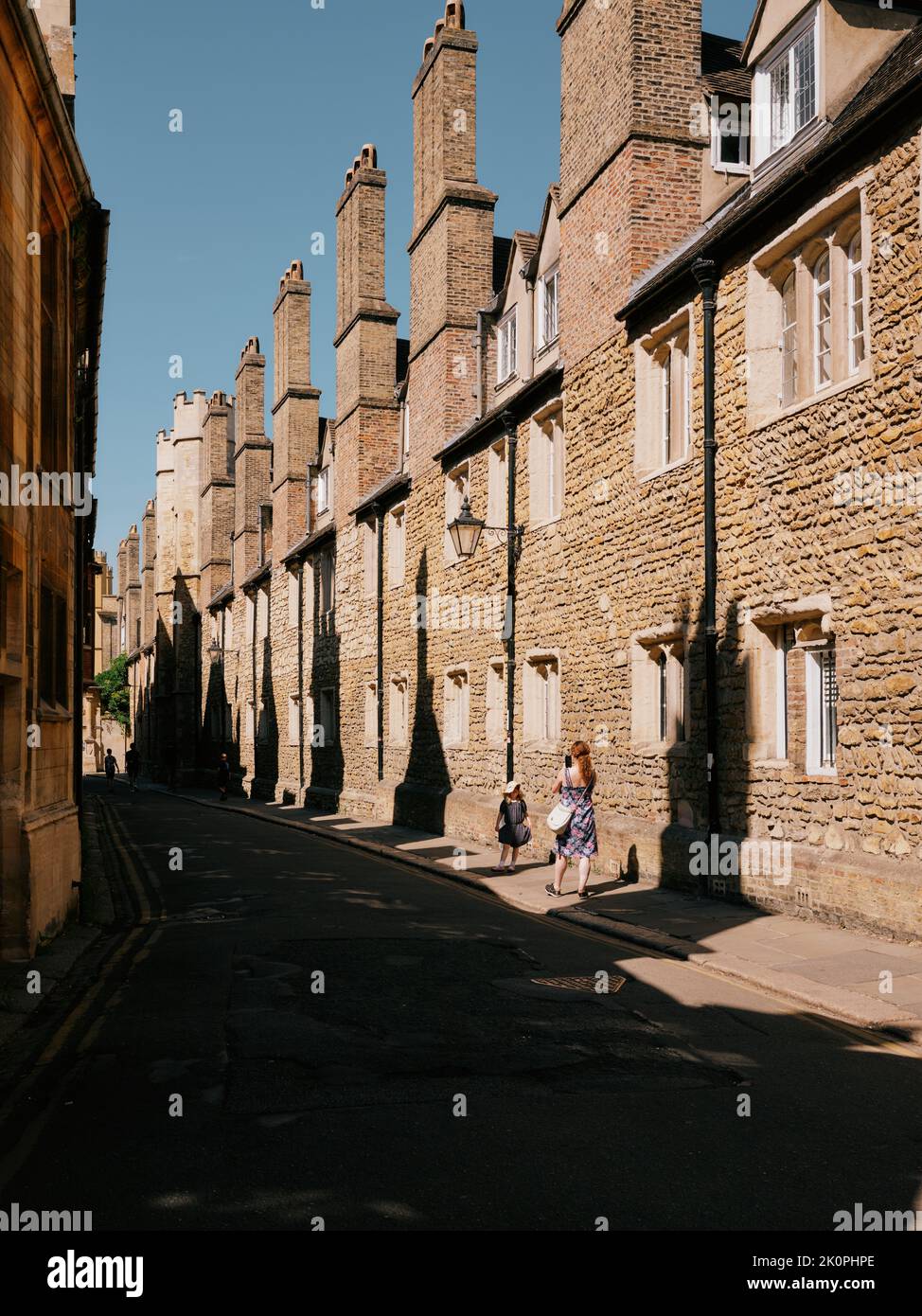 Tourists exploring the narrow streets and old buildings of Trinity ...