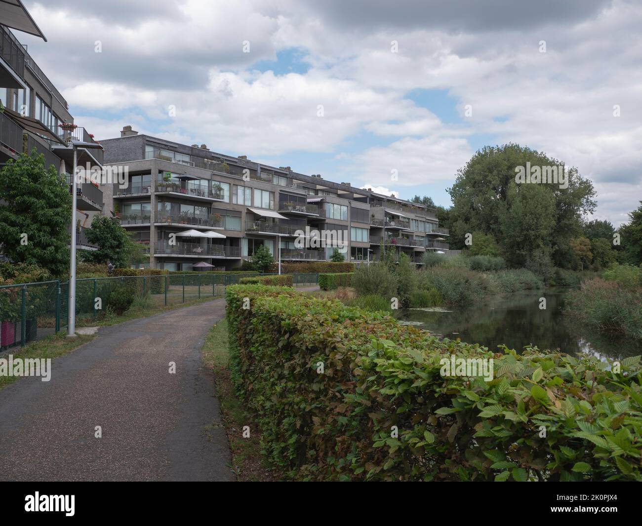 Lokeren, Belgium, August 27, 2022, Apartment building on the old Durme ...