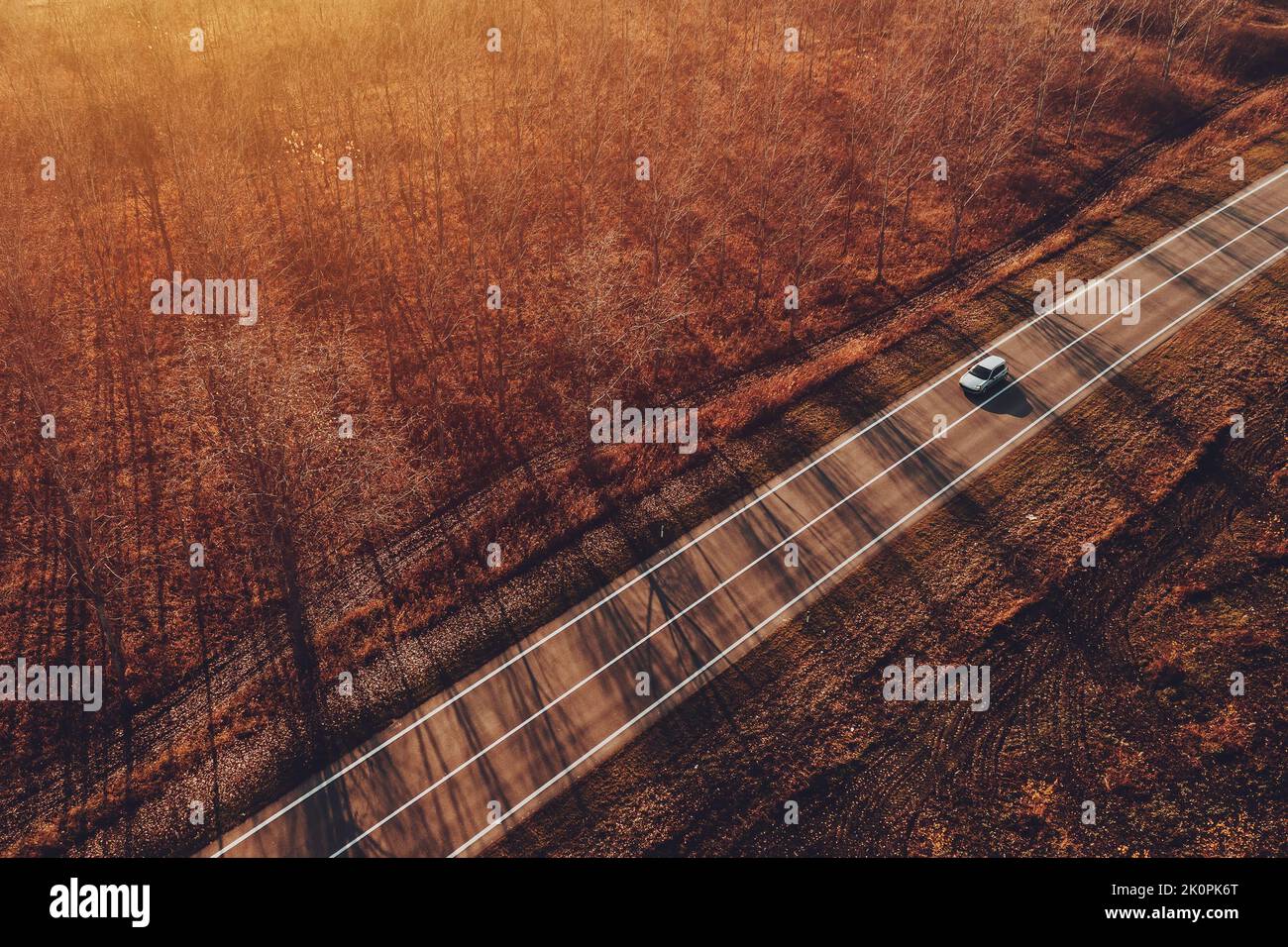 Car on the road from above, drone photography of single white vehicle ...