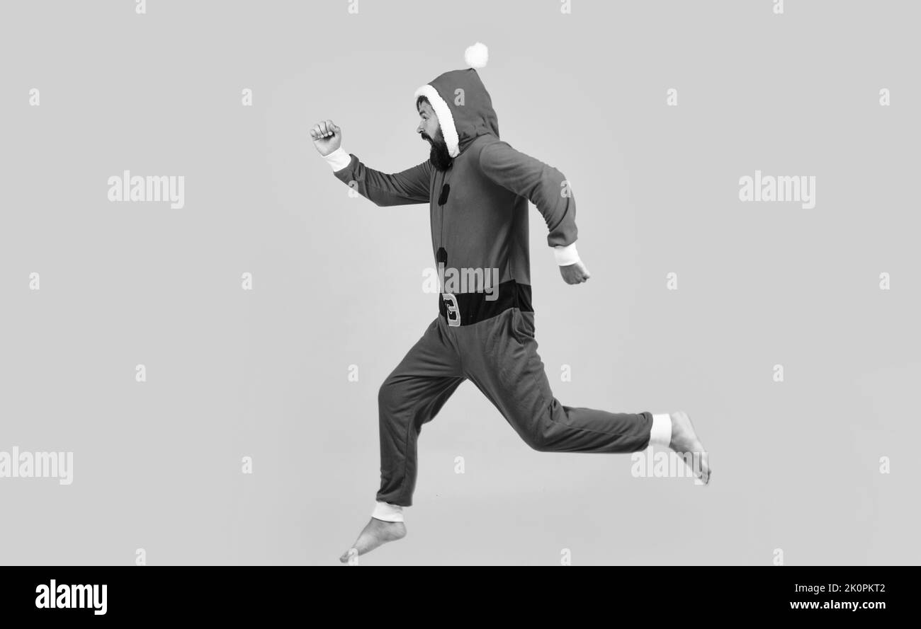 Christmas Eve. happy bearded man hipster wear red festive elf costume ...