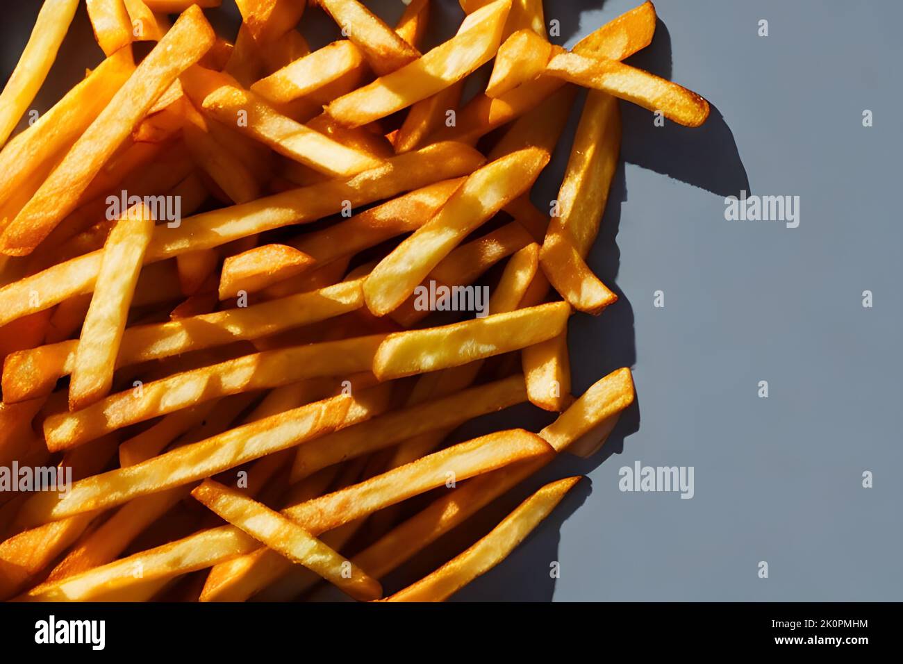 a top view of scattered french fries on a grey background Stock Photo ...