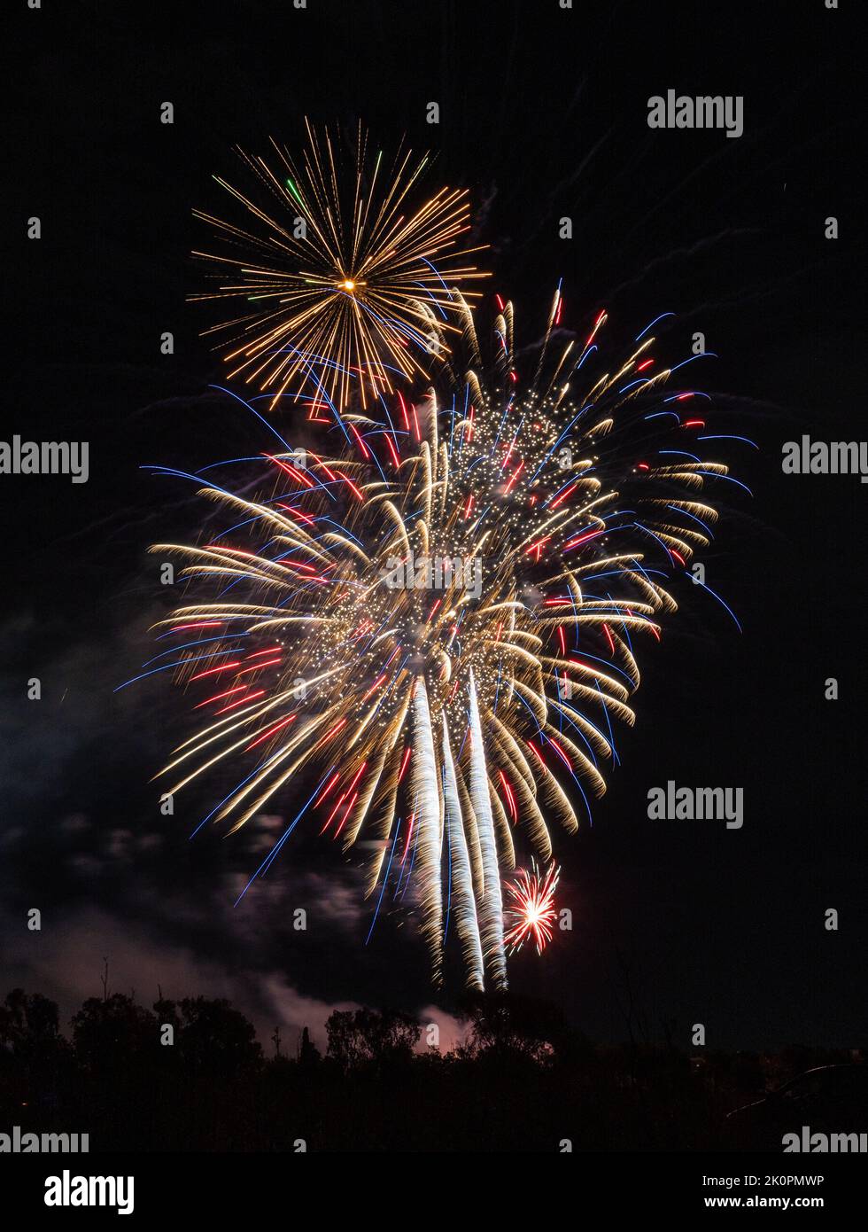 Fireworks of different colors with the black background Stock Photo - Alamy