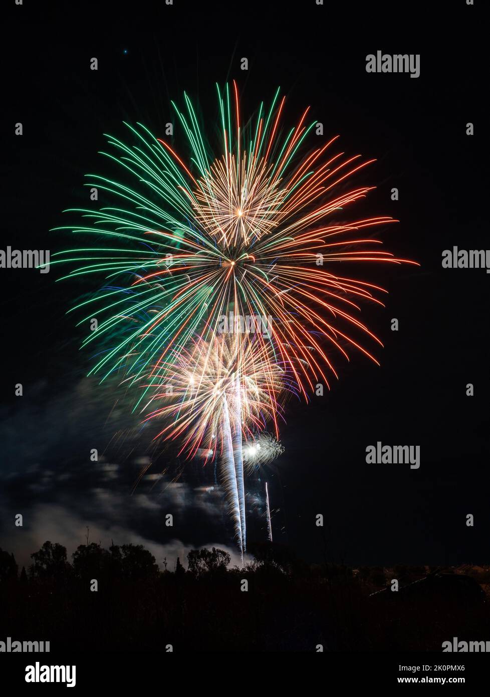 Fireworks of different colors with the black background Stock Photo - Alamy