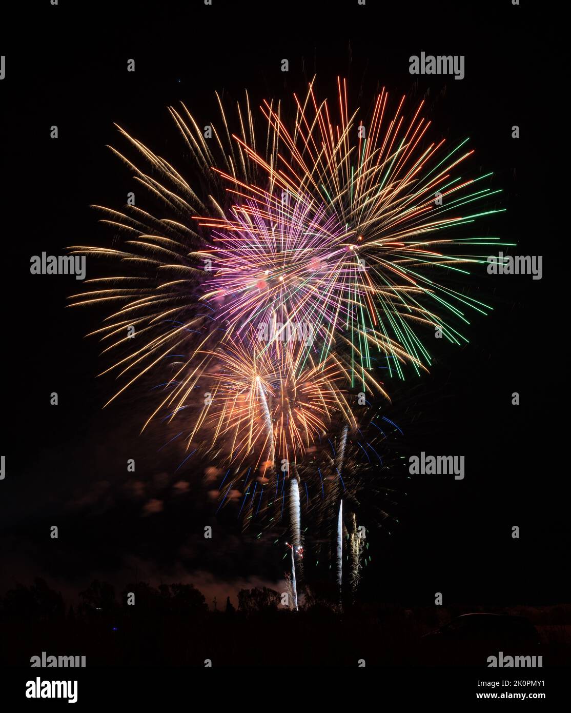 Fireworks of different colors with the black background Stock Photo - Alamy