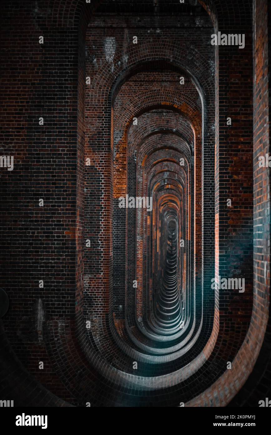 A vertical shot of huge oval-shaped brick frames Stock Photo - Alamy