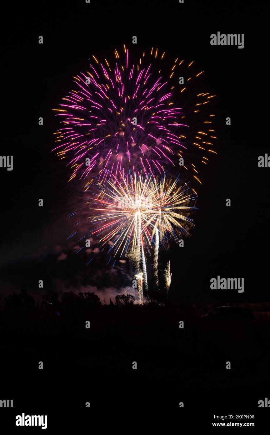 Fireworks of different colors with the black background Stock Photo - Alamy