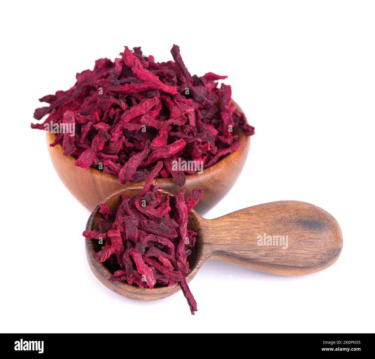 Dry beetroot in wooden bowl and spoon, isolated on the white background ...